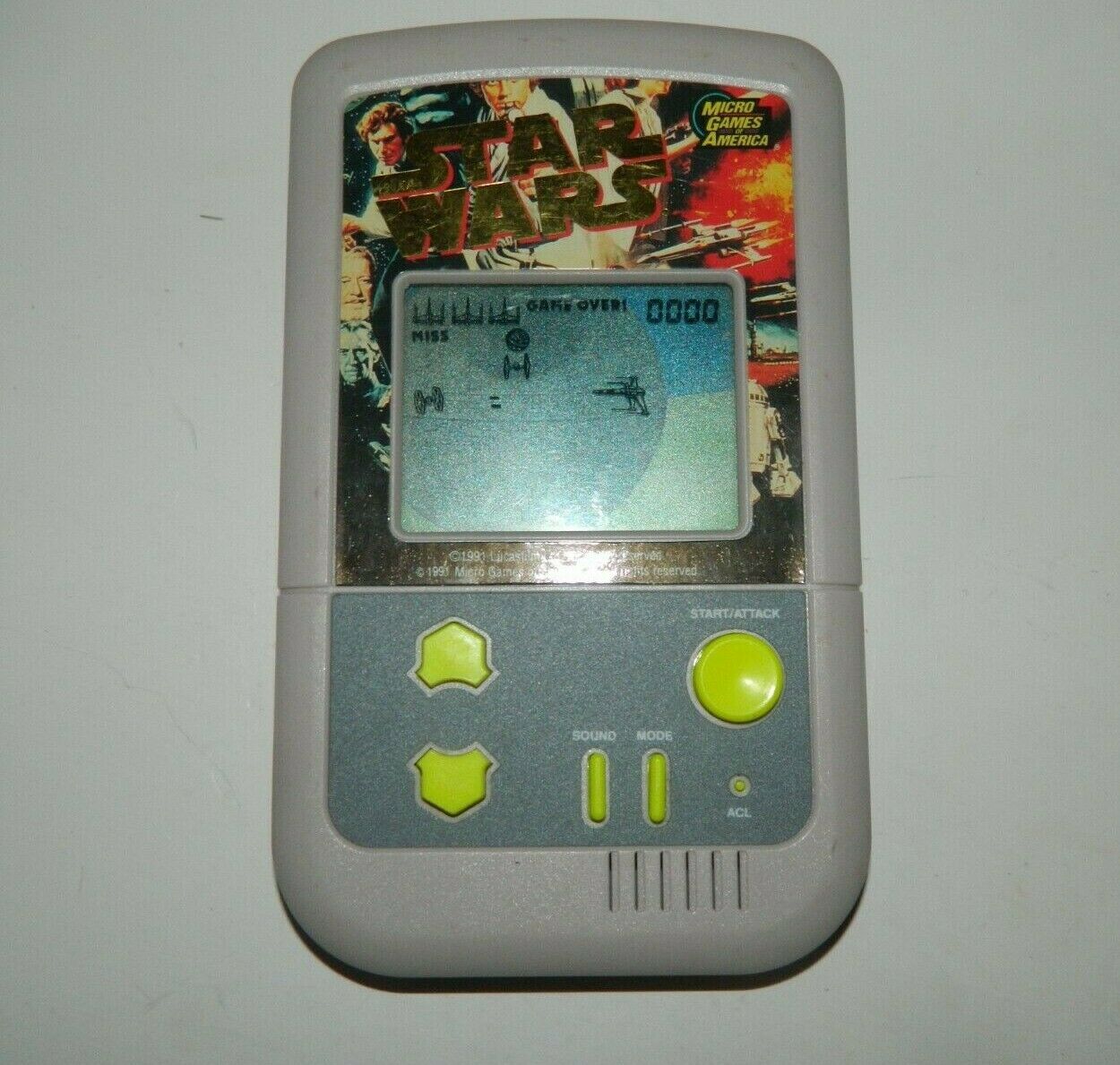 Star Wars - Handheld Electronic Game (logo doré) • Collection • Star ...